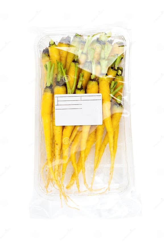 Mini Yellow Carrots in Labeled Packaging on a White Background Stock ...