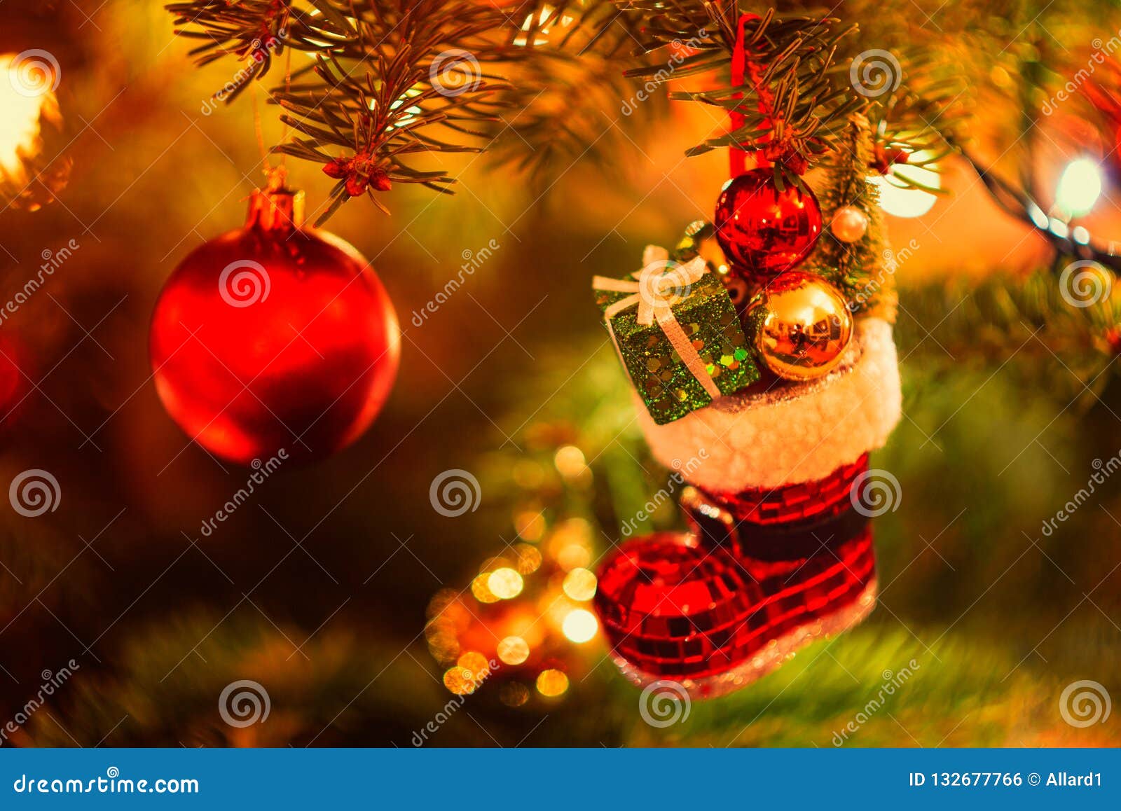 Miniature Boot Hanging in Christmas Tree Stock Photo - Image of focus ...