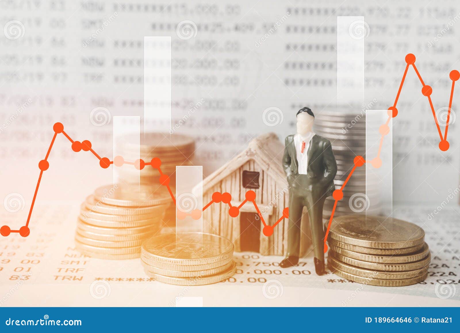 Miniature Business Man with Stack of Coins , House and Graph on Book ...