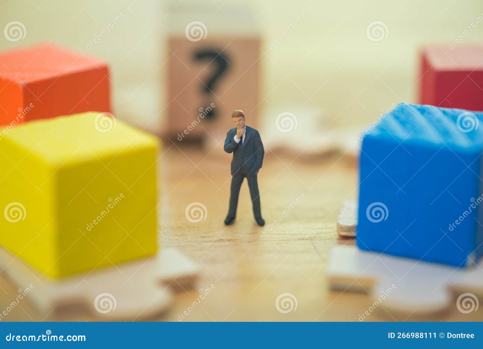 Miniature Businessman Thinking and Standing with Question Mark. the ...