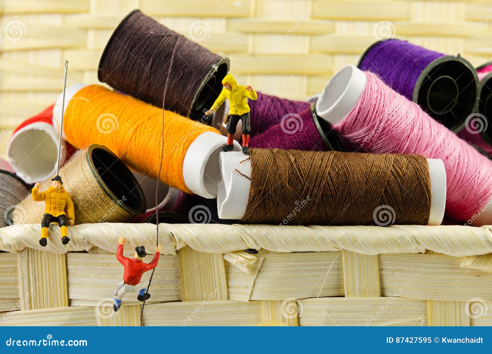 Miniature Climbers On Spools Of Threads Royalty-Free Stock Photography ...