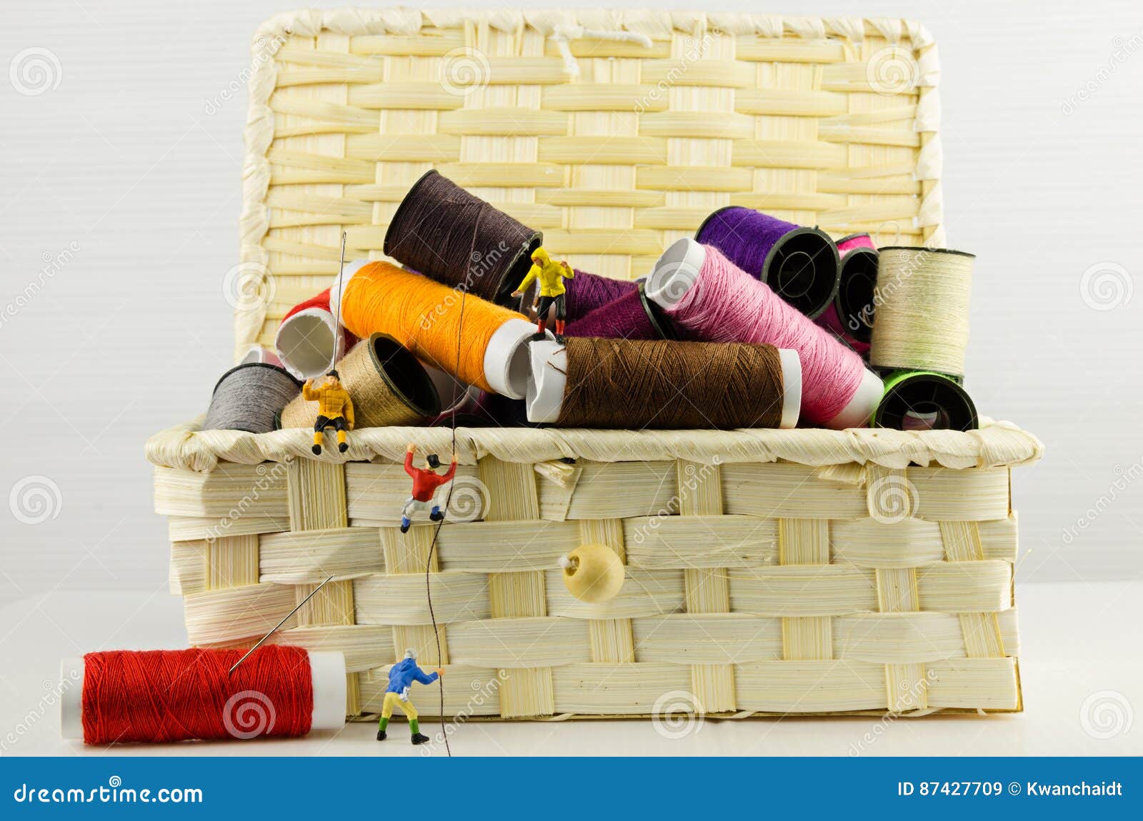 Miniature Climbers On Spools Of Threads Royalty-Free Stock Photography ...