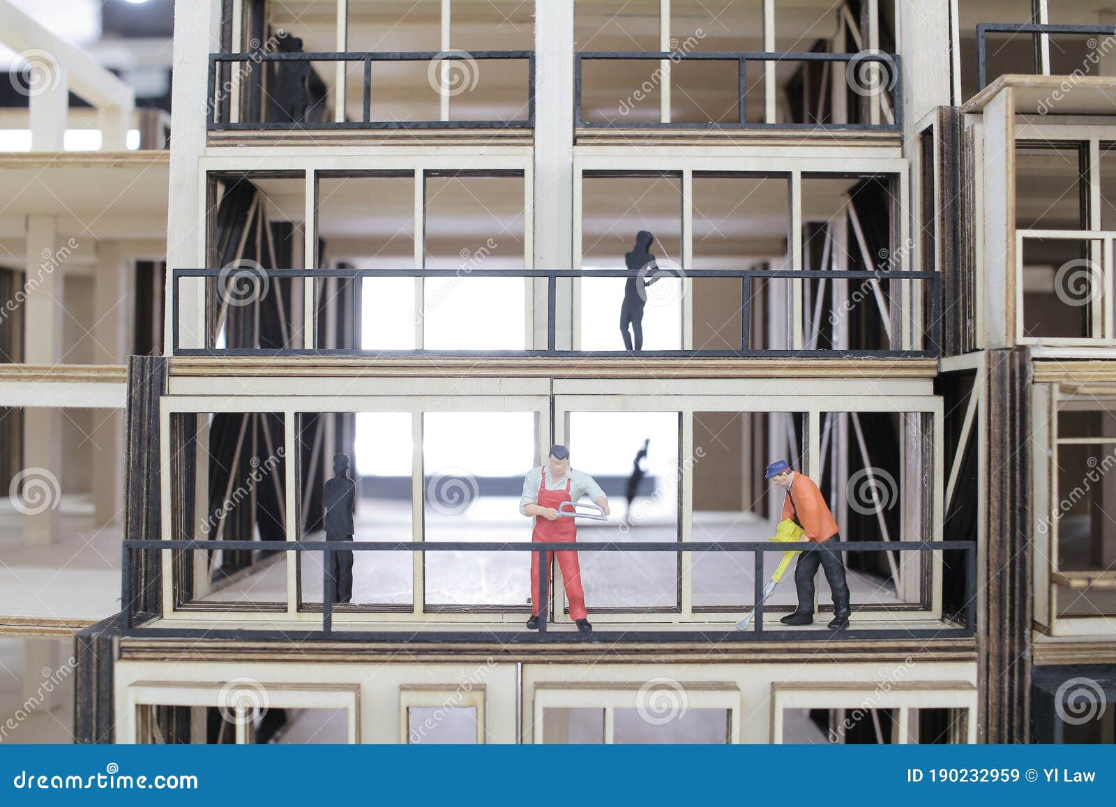 The Miniature Construction Workers Building Plans Stock Image - Image ...