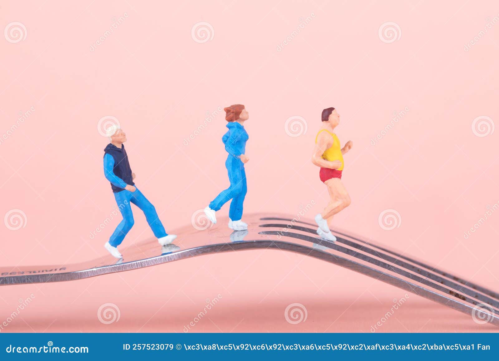 Miniature Doll Model Running on a Fork Stock Image - Image of exercise ...