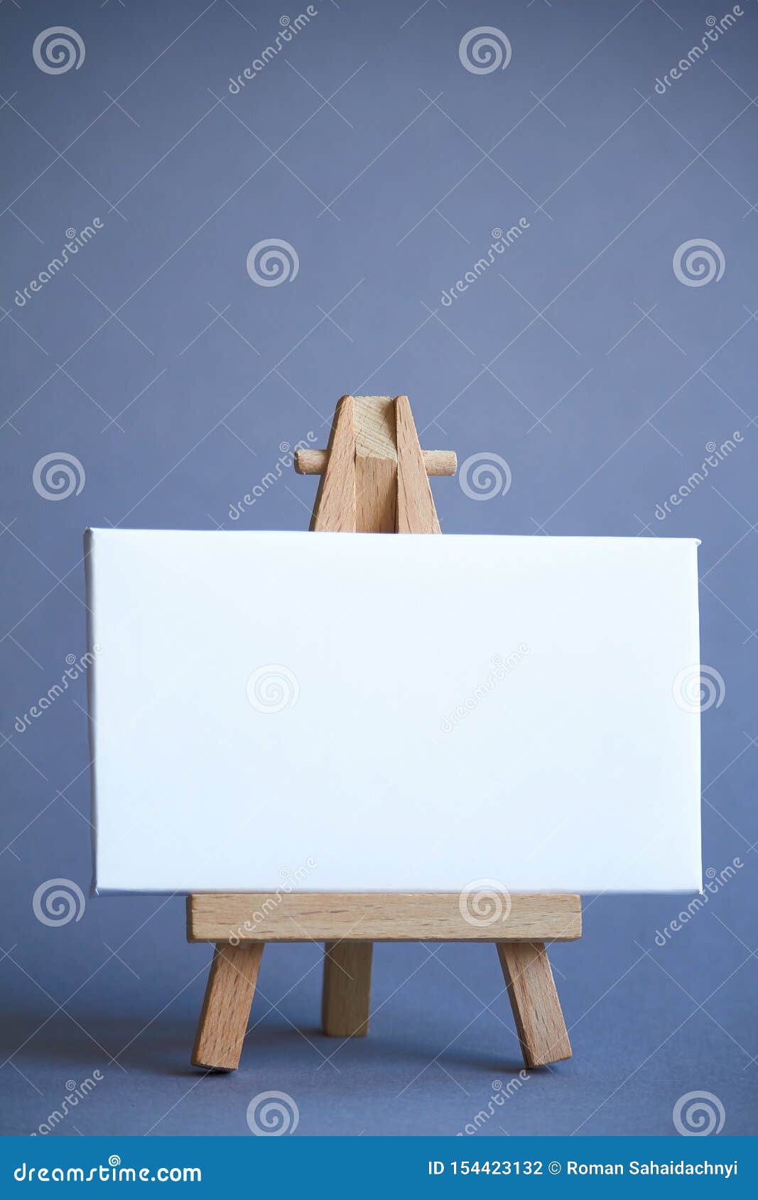 A Miniature Easel with a White Board for Writing, Pointer on White ...