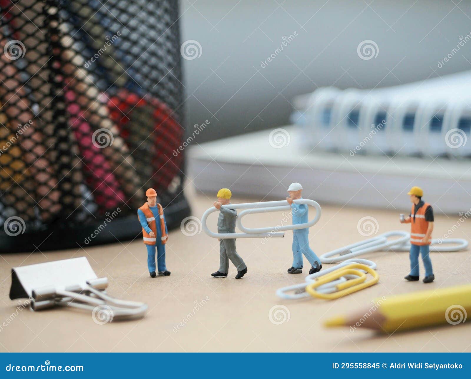 Miniature Figure of People at Table with Blurred Background. Office ...
