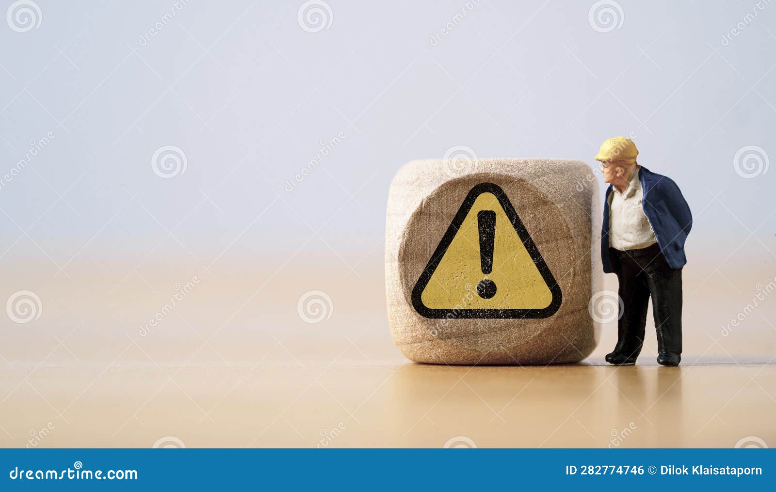 Miniature Figure of Senior Engineer Standing and See at Warning ...