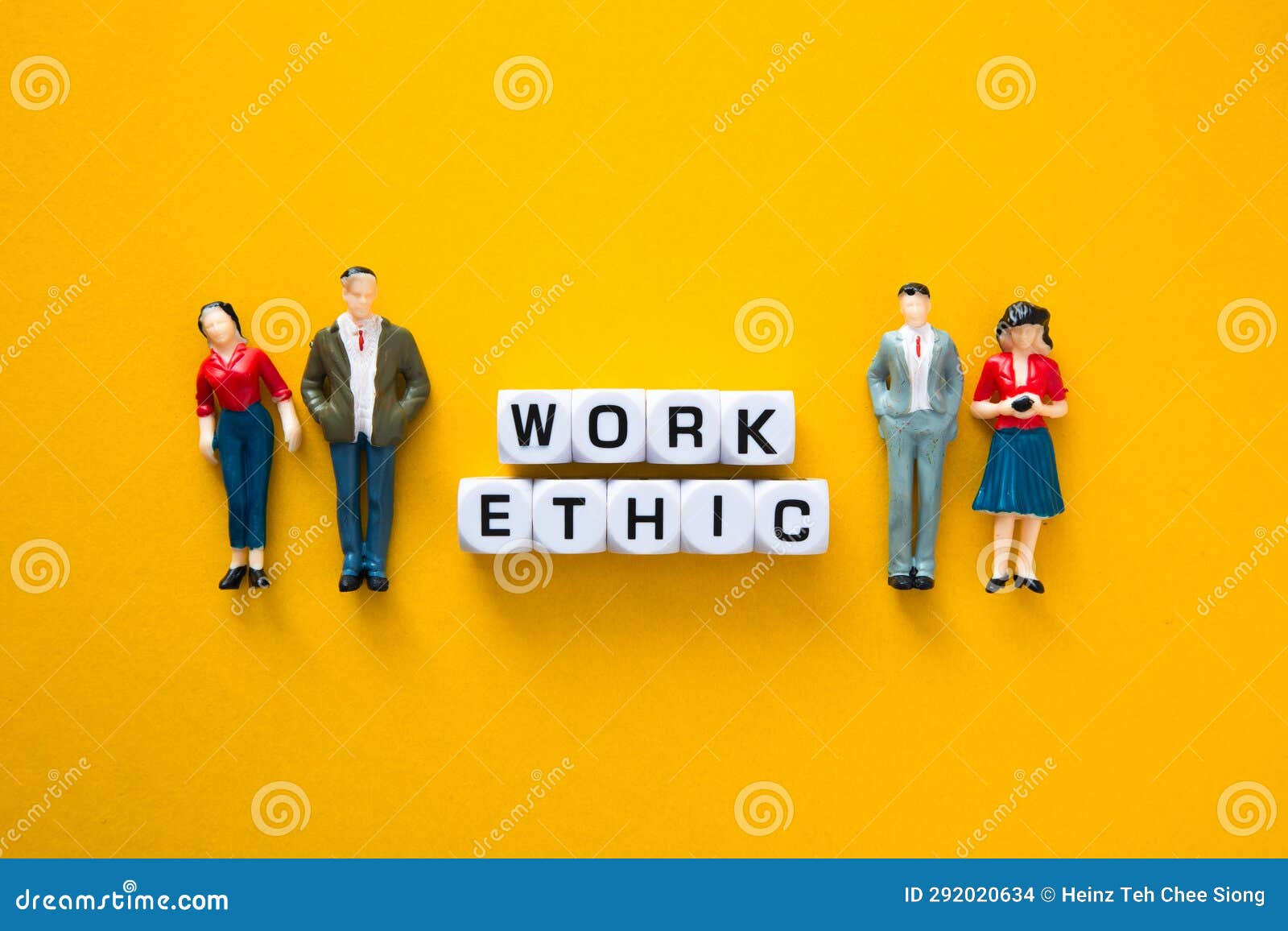 Miniature Figure with Work Ethic Words on Yellow Background Stock Photo ...