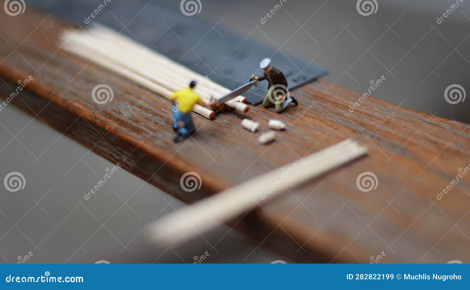 Miniature Figure of a Worker Cutting Toothpicks. Stock Image - Image of ...