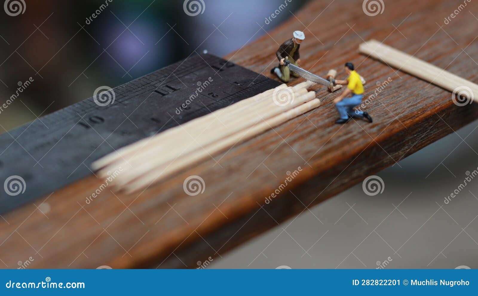 Miniature Figure of a Worker Cutting Toothpicks. Stock Image - Image of ...