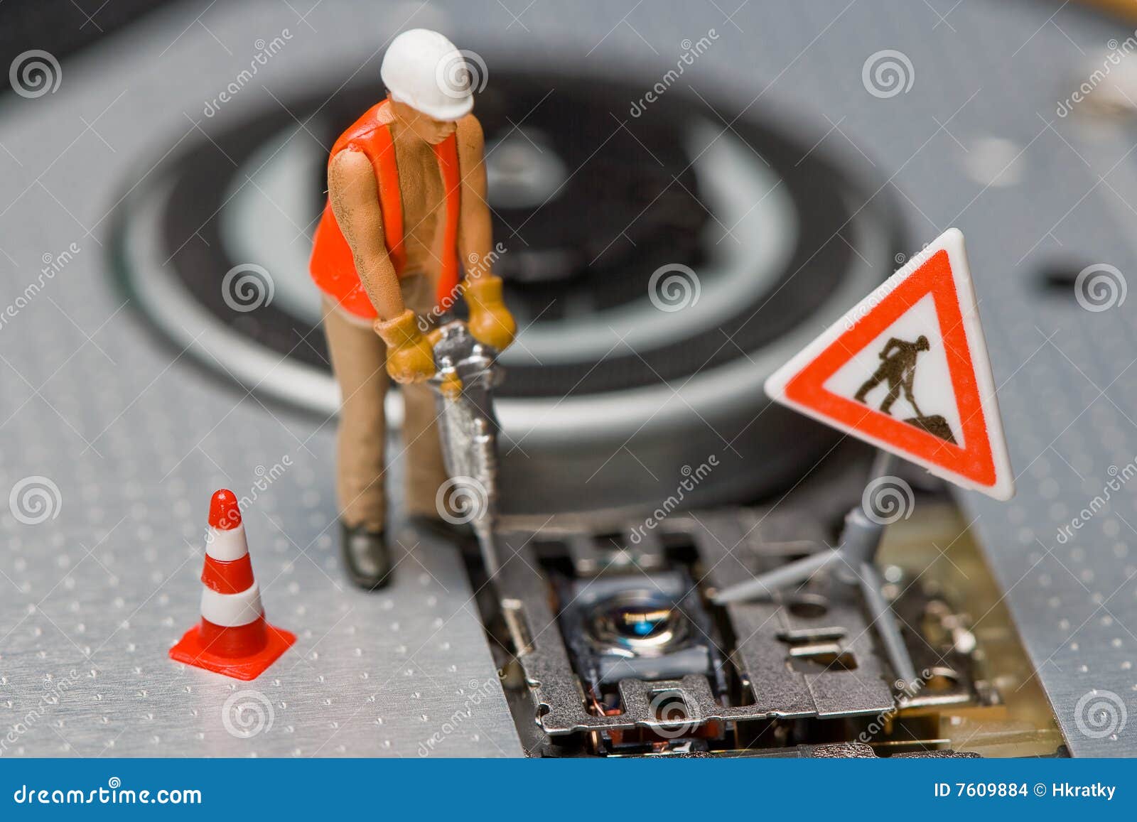 Miniature Figures Working on a DVD Drive. Stock Photo - Image of ...