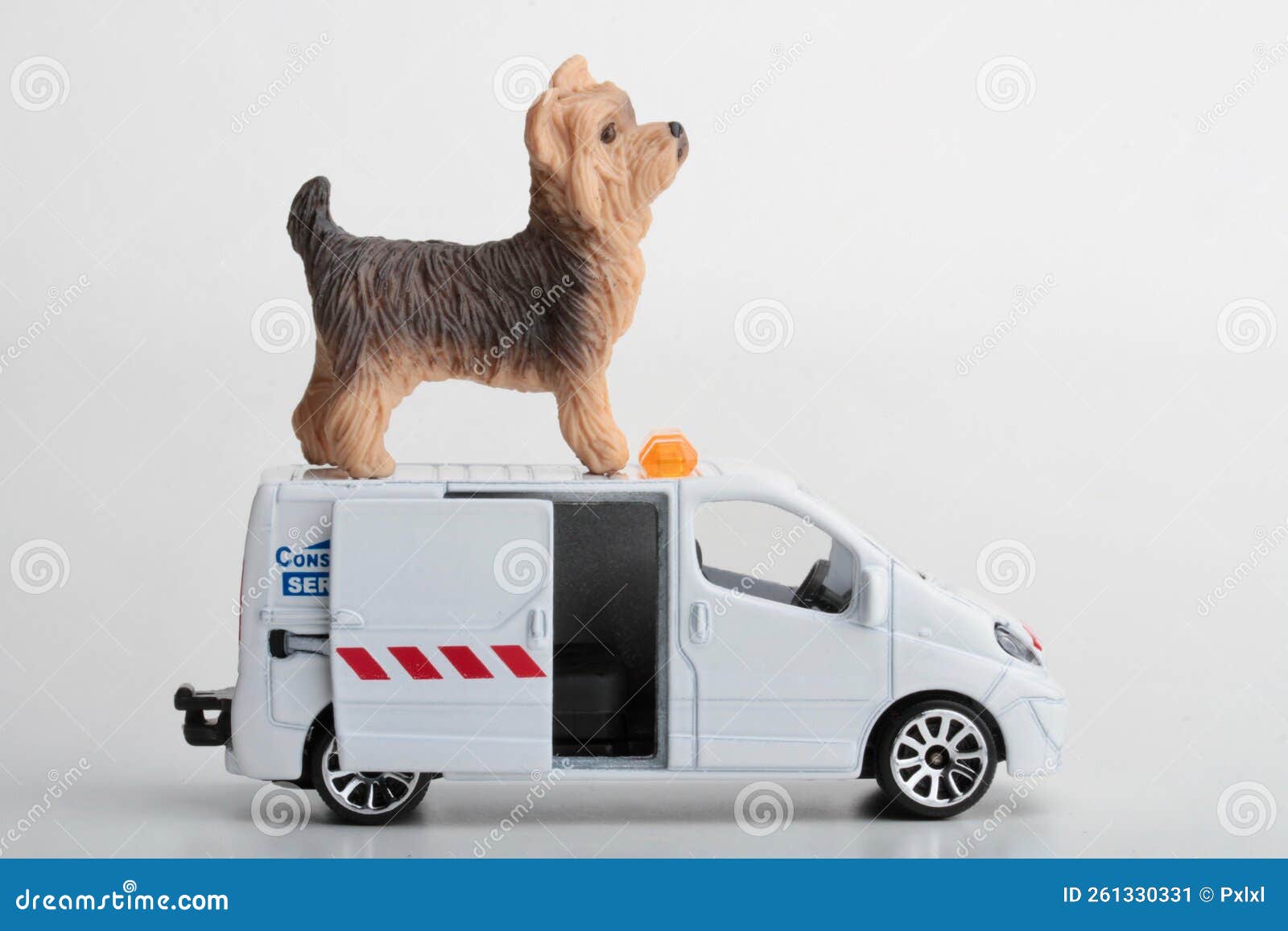 Miniature Figurine of a Dog on the Top of a Veterinary Ambulance Stock ...