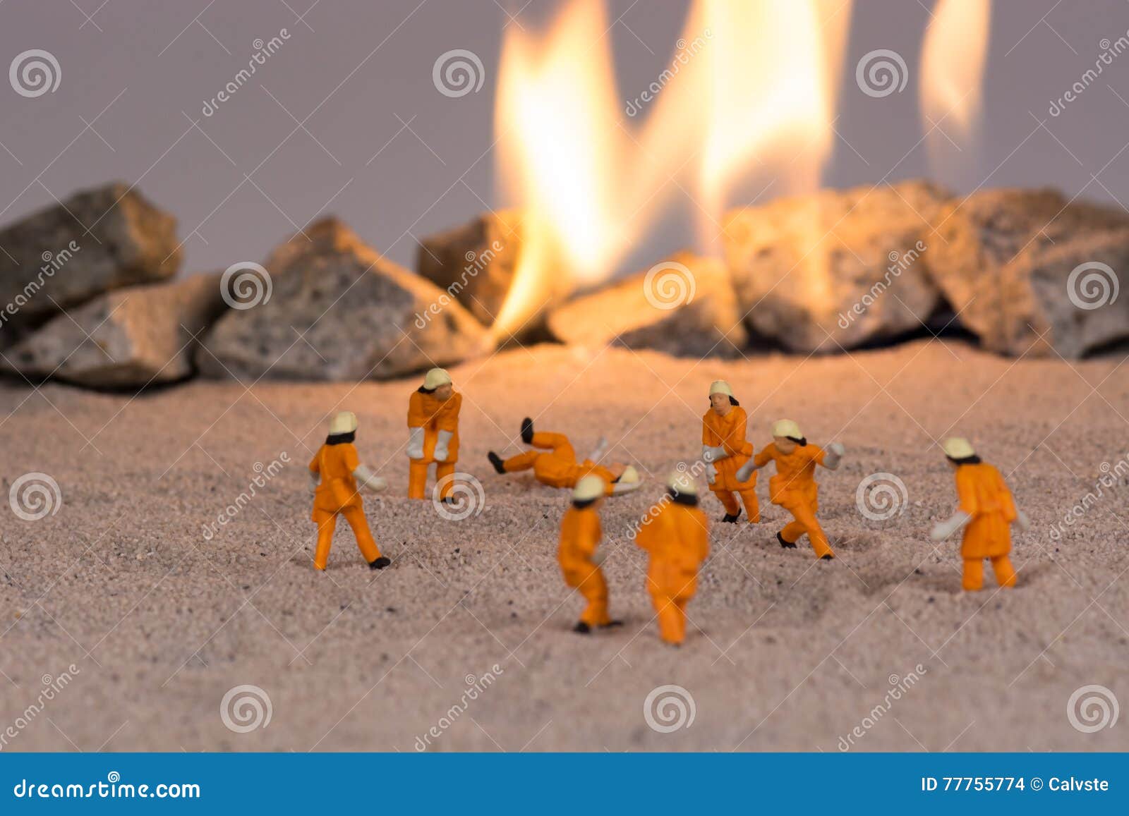 Miniature Firemen at Work Near Real Fire Stock Photo - Image of idea ...