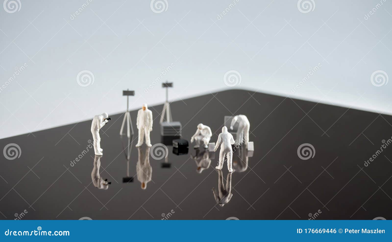 Miniature Forensic Team Examining Black Surface Stock Photo - Image of ...