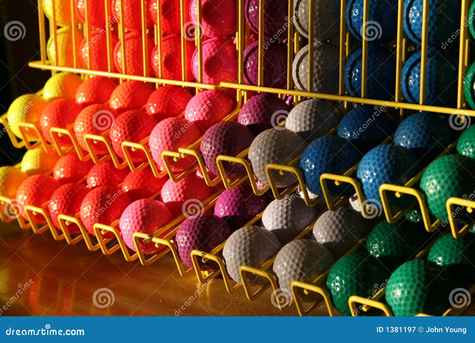 Miniature Golf Balls in a Rack Stock Image - Image of purple, close ...