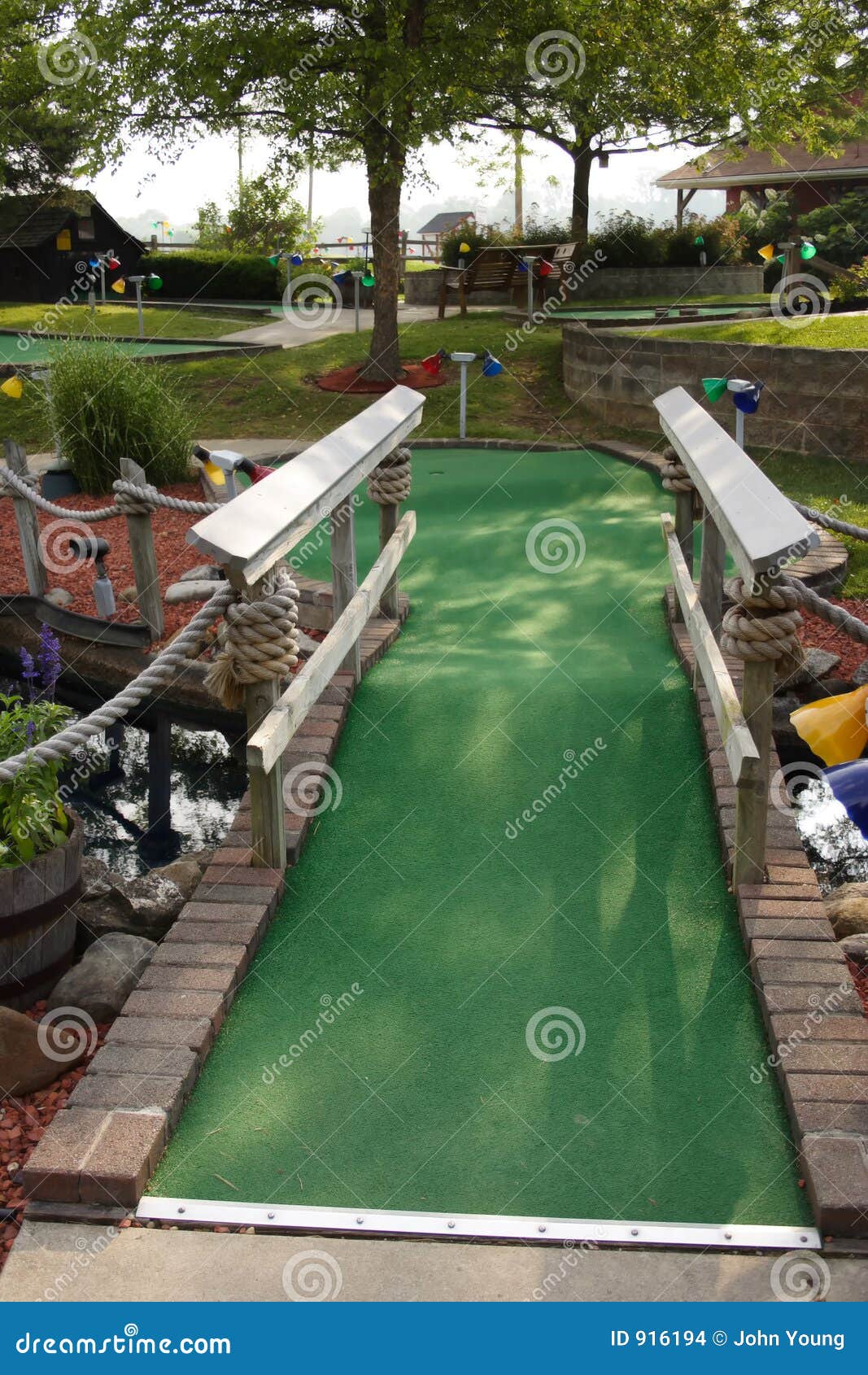 A Miniature Golf Ball Just Before Falling Into A Miniature Golf Hole ...