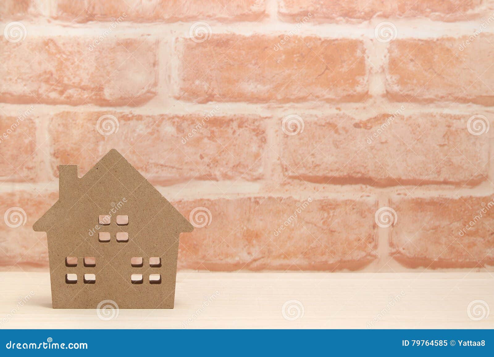 Miniature House in Front of Brick Wall. Stock Image - Image of building ...