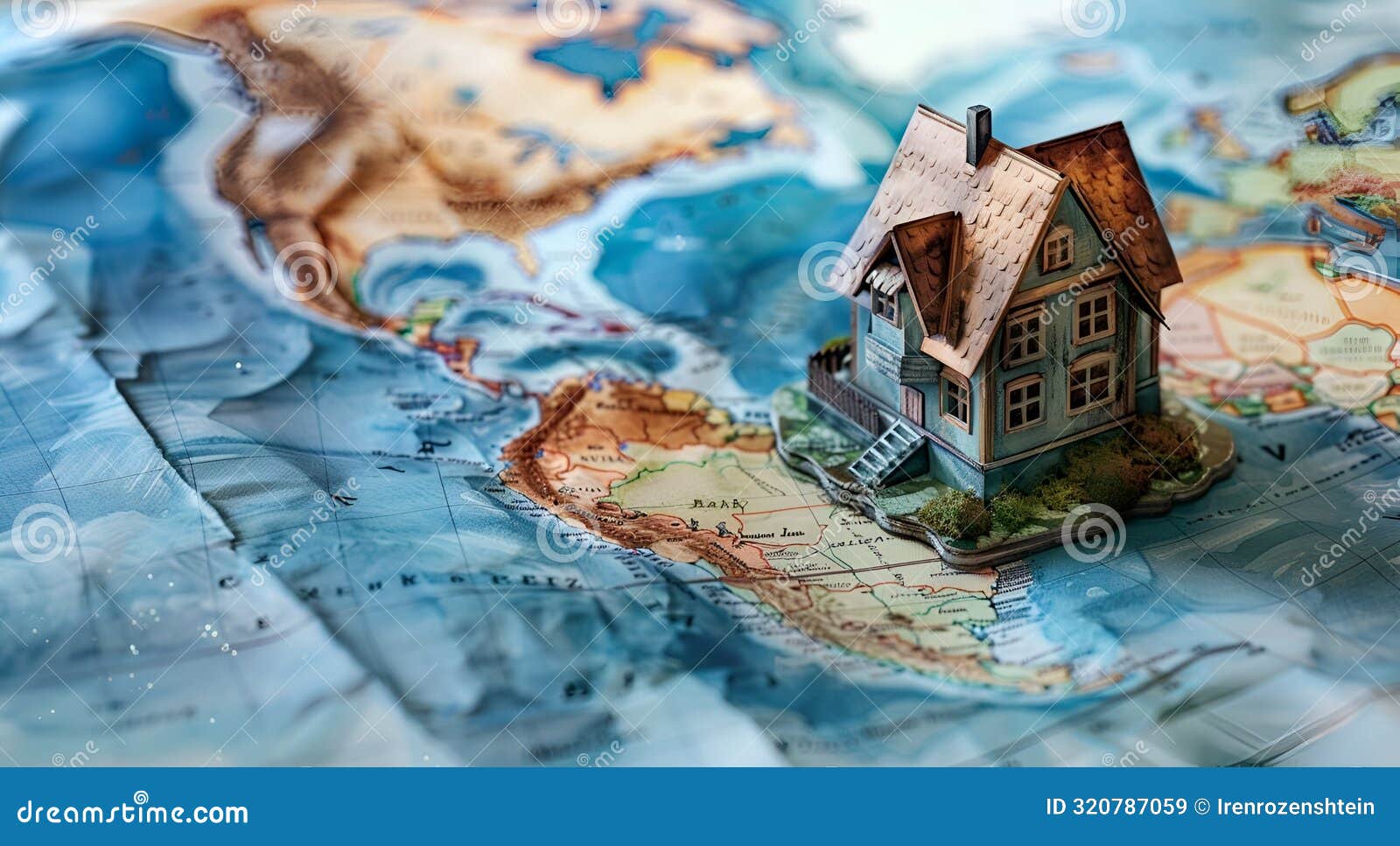 Miniature House on a Map Showcasing Global Real Estate Stock ...