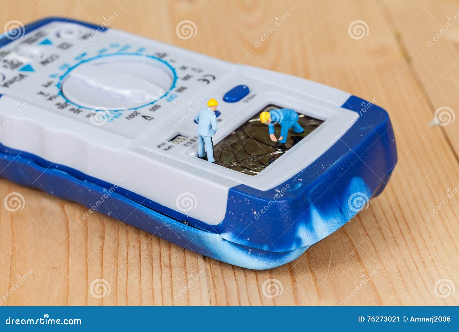Miniature Maintenance Team Repairing a Broken Multimeter Stock Image ...