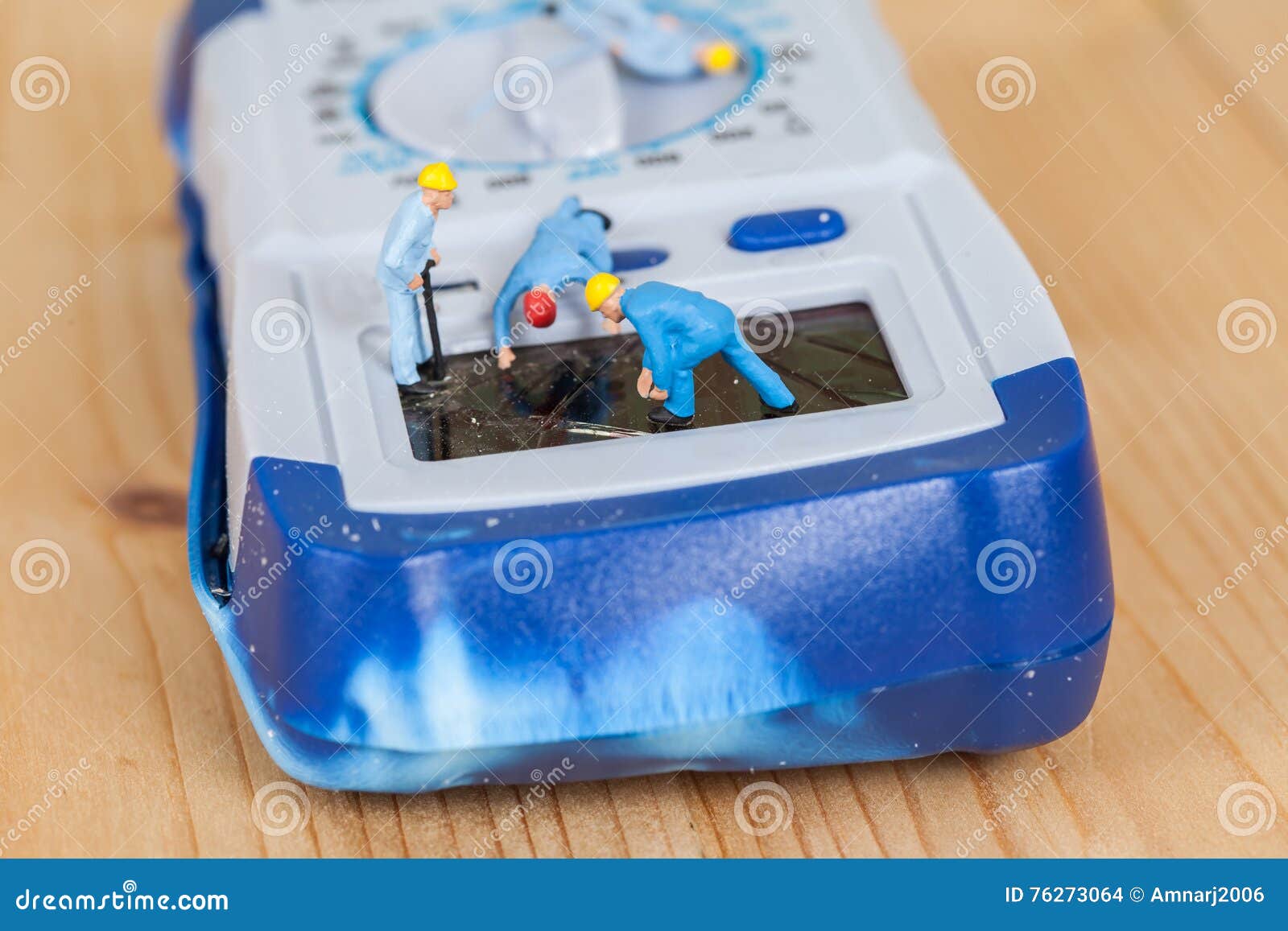 Miniature Maintenance Team Repairing a Broken Multimeter Stock Photo ...