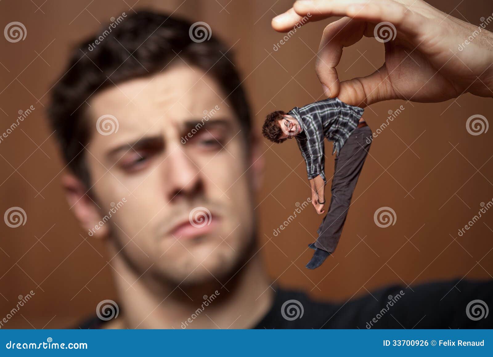 Miniature Man Got Caught by a Giant Stock Photo - Image of finger ...