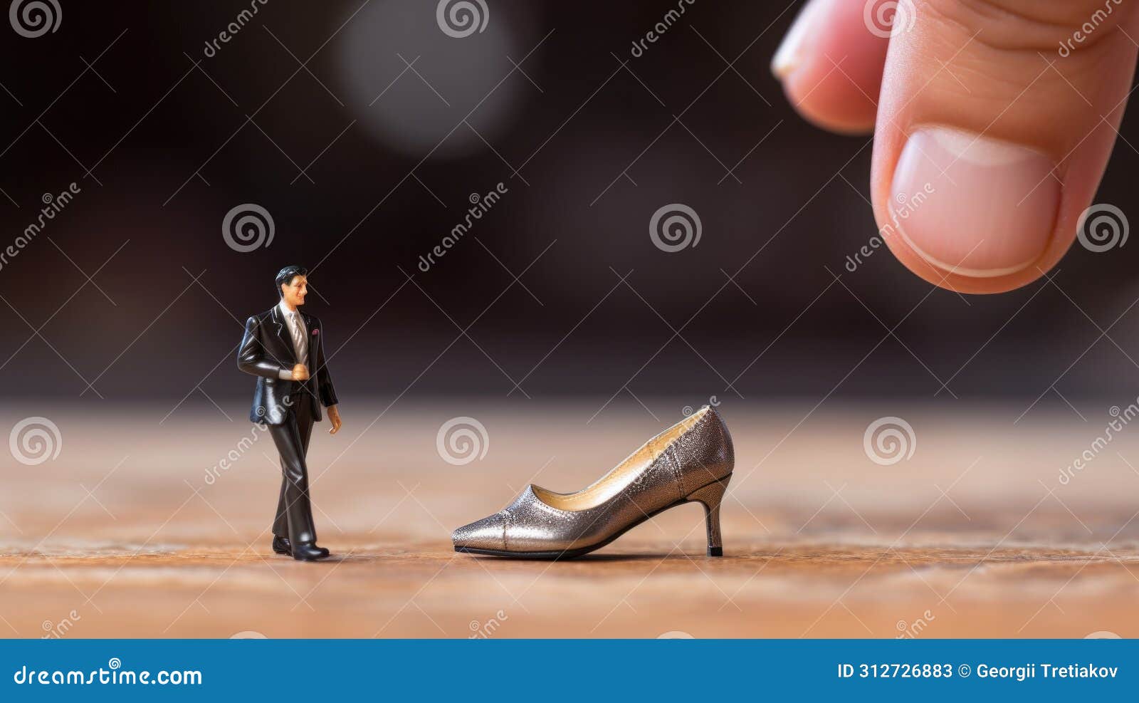 Giant Finger Pointing At Miniature Businessmen Figures Stock Photo ...