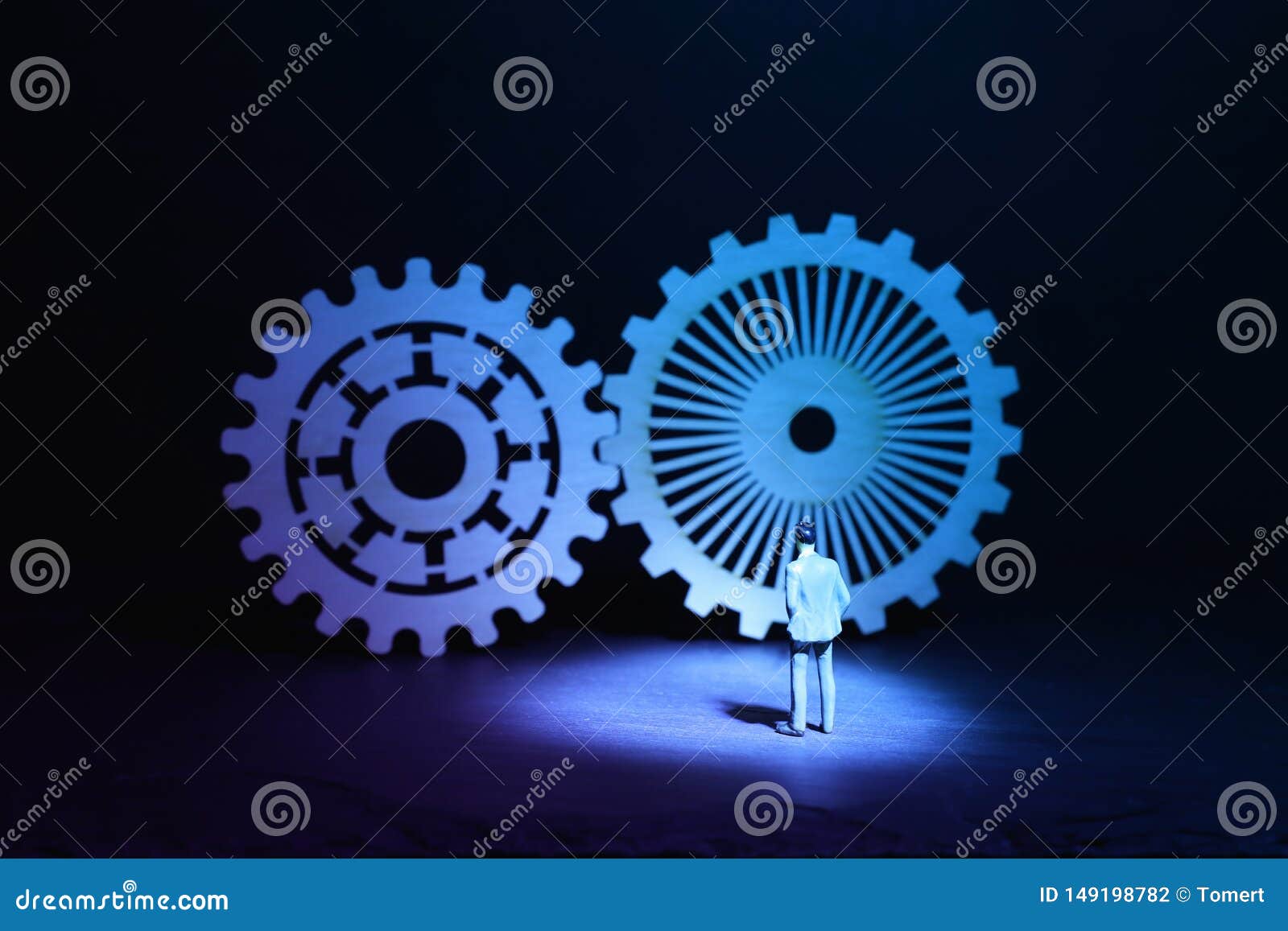 Miniature Man Looking at Cogwheel in Set of Gears Mechanism. Problem ...