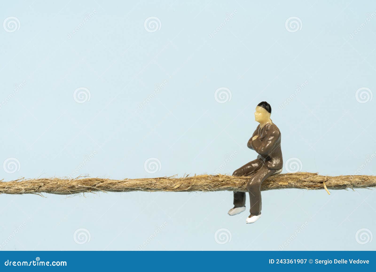Man sitting on a rope stock image. Image of closeup - 243361907
