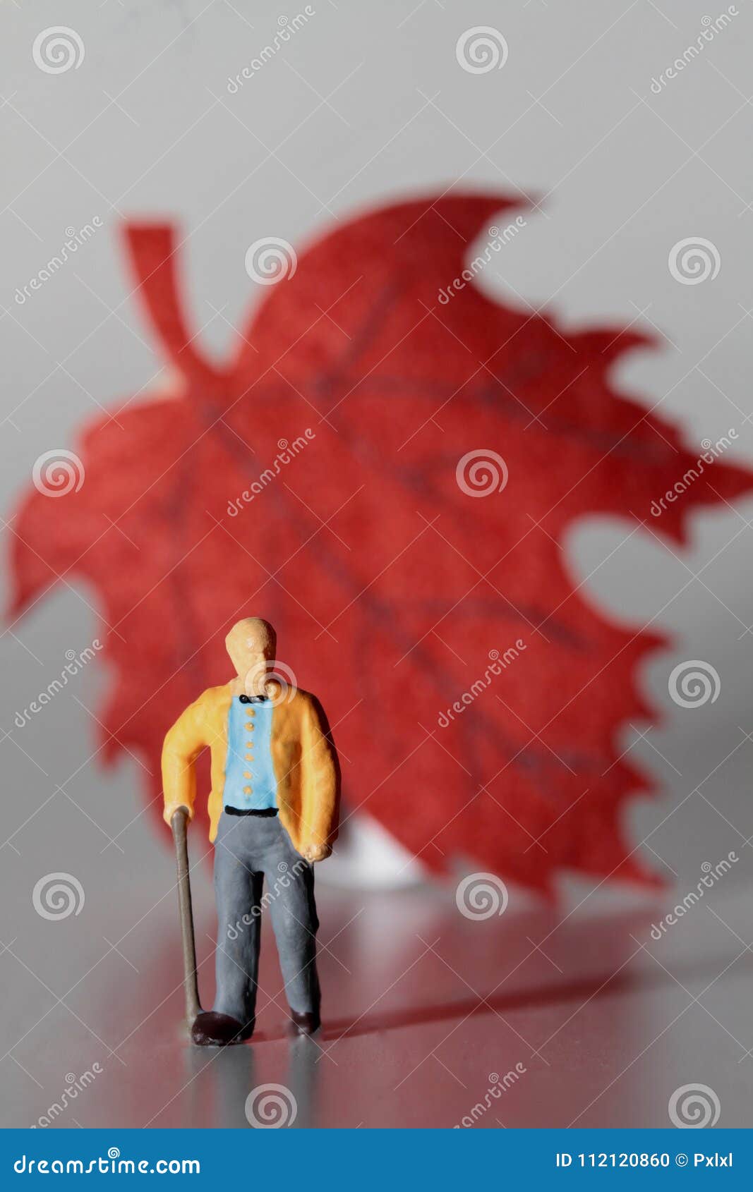 Miniature of an Old Man with a Fall Leaf on the Background Stock Photo ... Miniature of an Old Man with a Fall Leaf on the Background Stock Photo ...