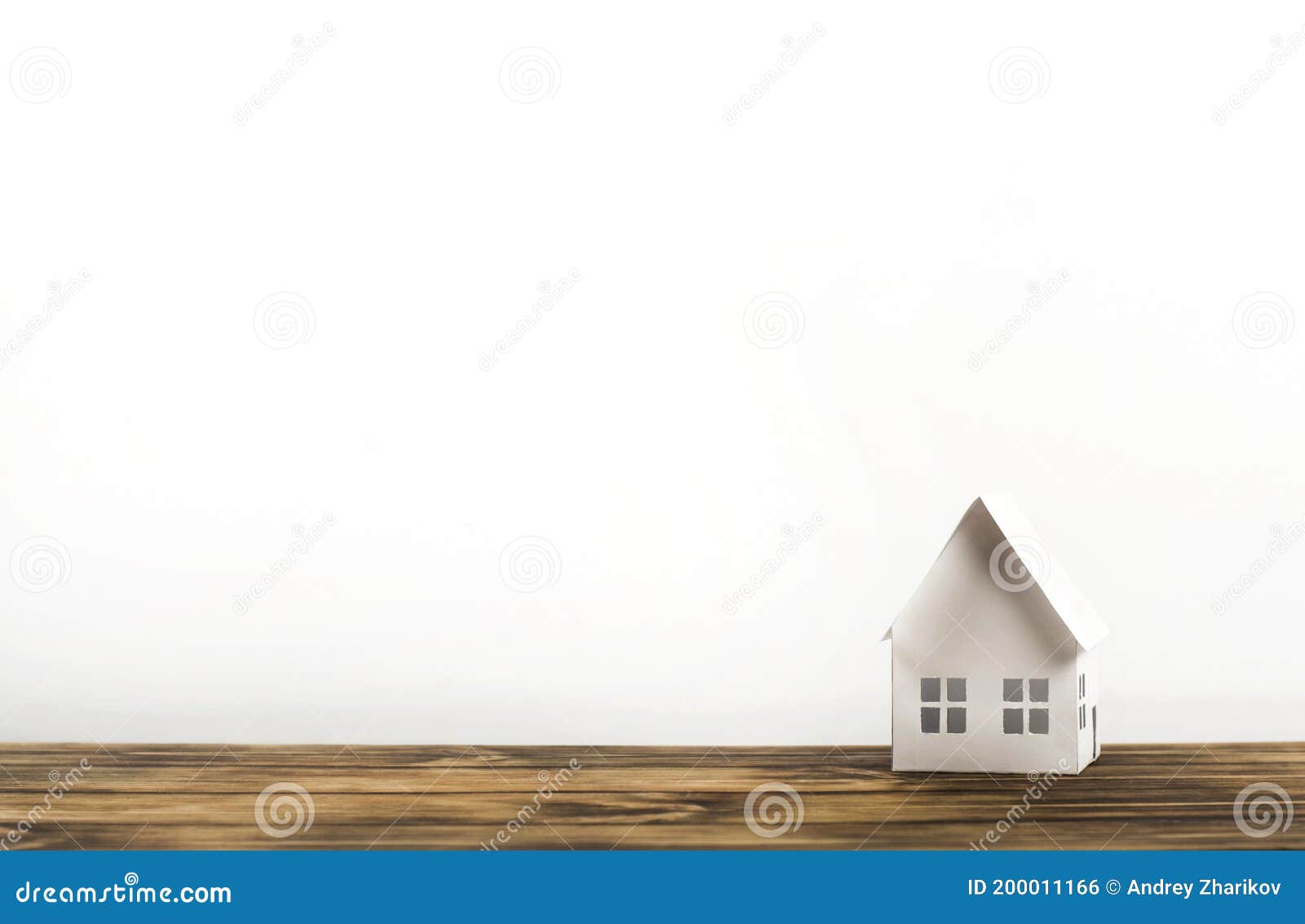 Miniature Paper House on a Wooden Table. Concept Stock Photo - Image of ...