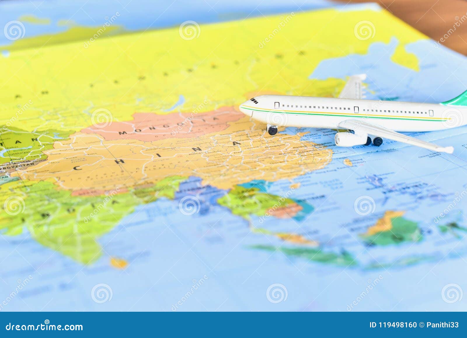 Miniature Passenger Airplane on a World Map Stock Photo - Image of ...