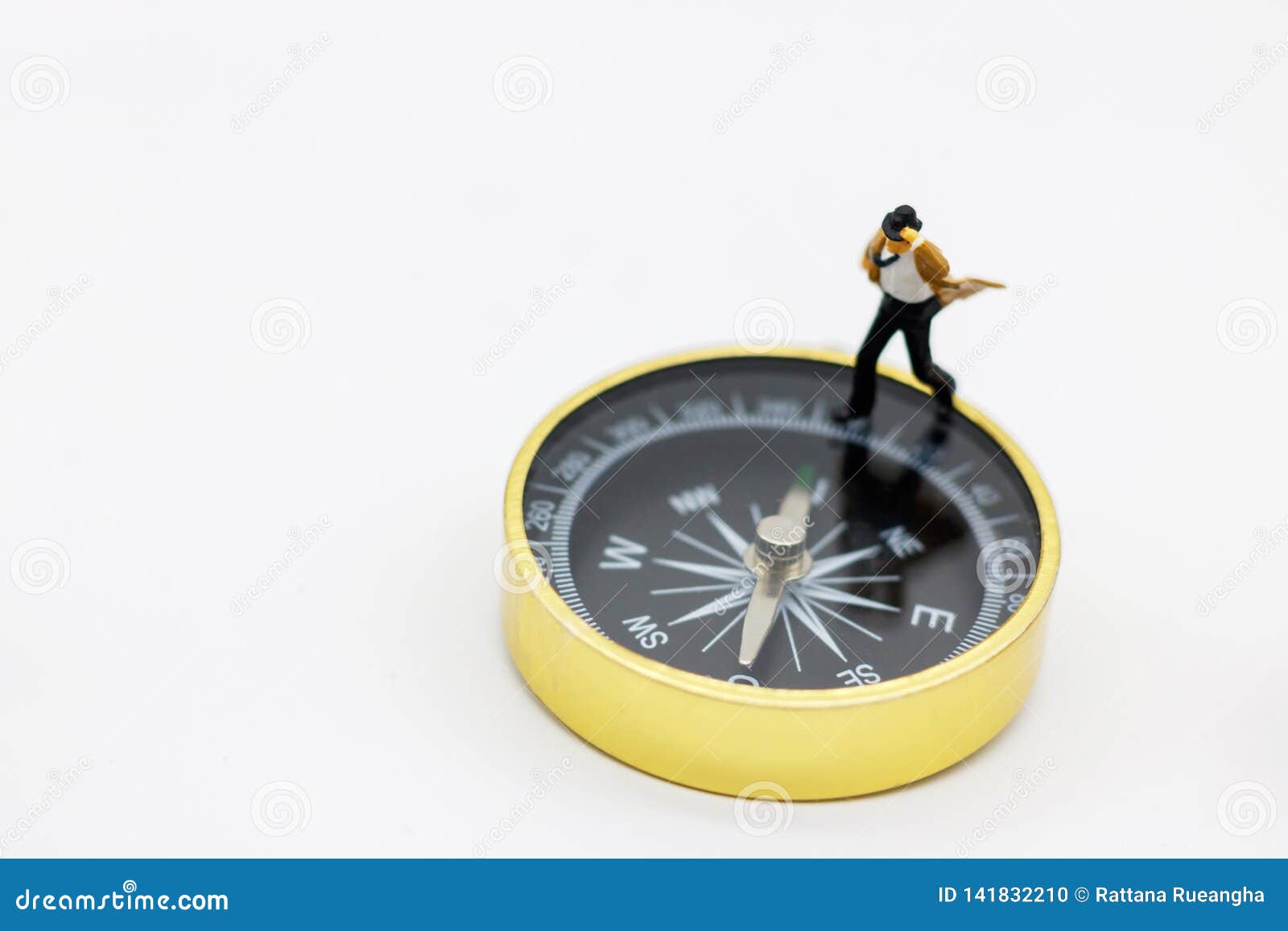 Miniature People: Businessman Standing on Compass. Business Solutions ...