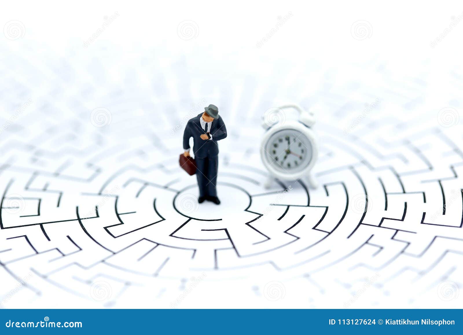 Miniature People : Businessman Standing on Maze,Concepts of Fi Stock ... Miniature People : Businessman Standing on Maze,Concepts of Fi Stock ...