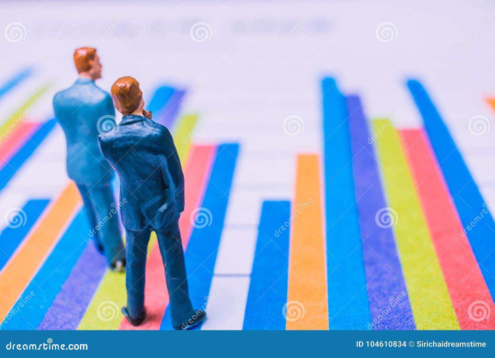 Miniature People : Businessman Standing on a Paper Graph Chart Stock ...