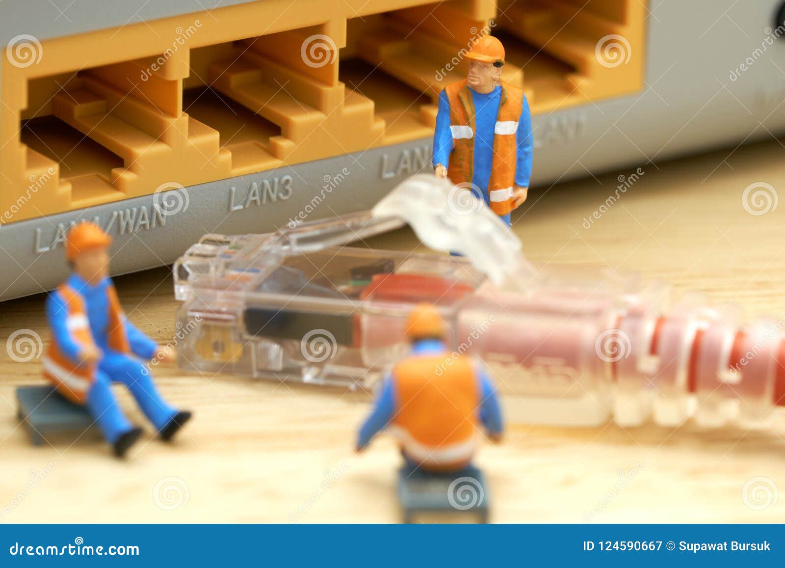 Worker Connect A Network Cable With RJ45 Sockets By Punch-down Tool ...