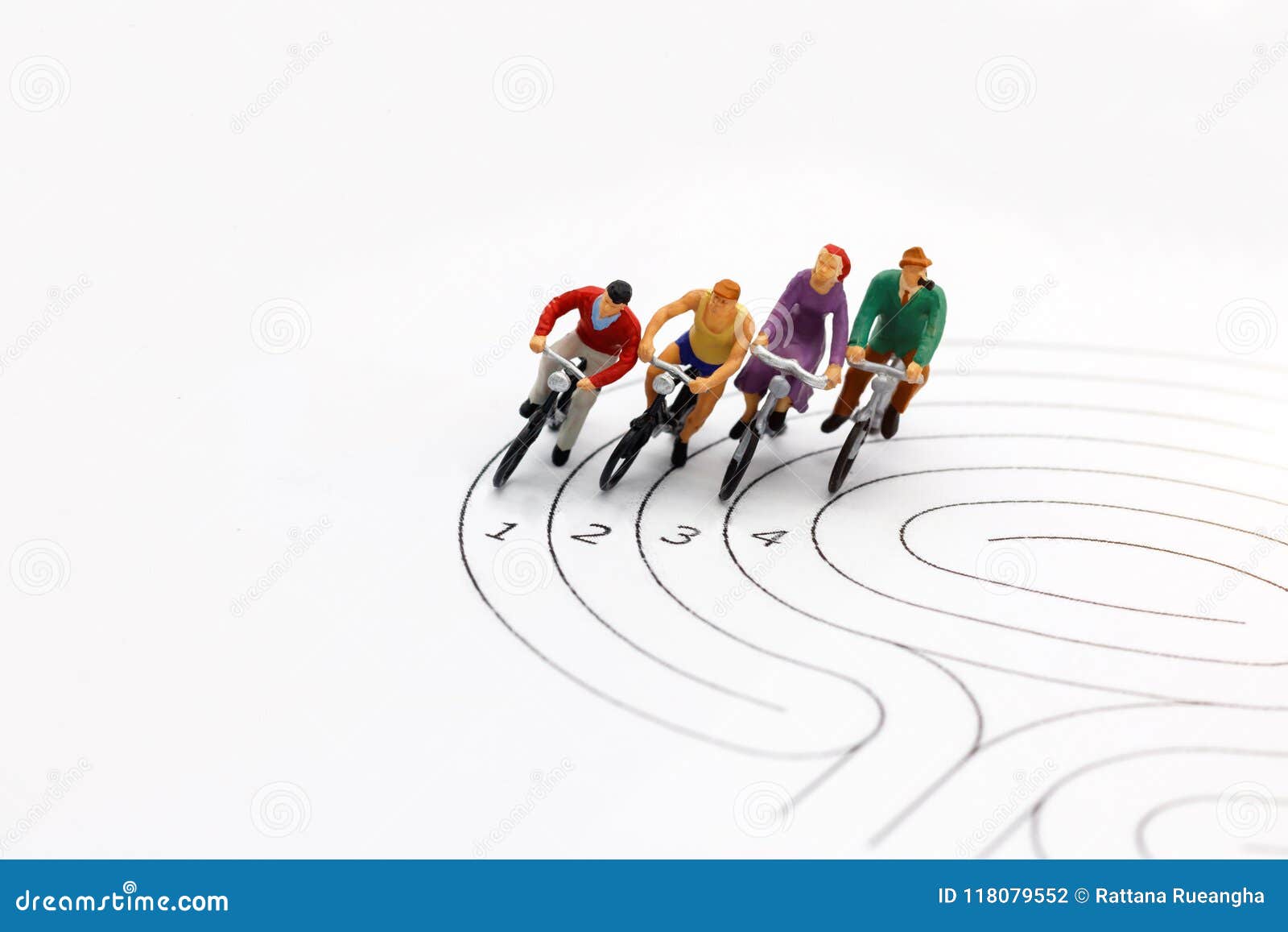 Miniature People: Cyclist on the Race Against Competitors. Stock Photo ...