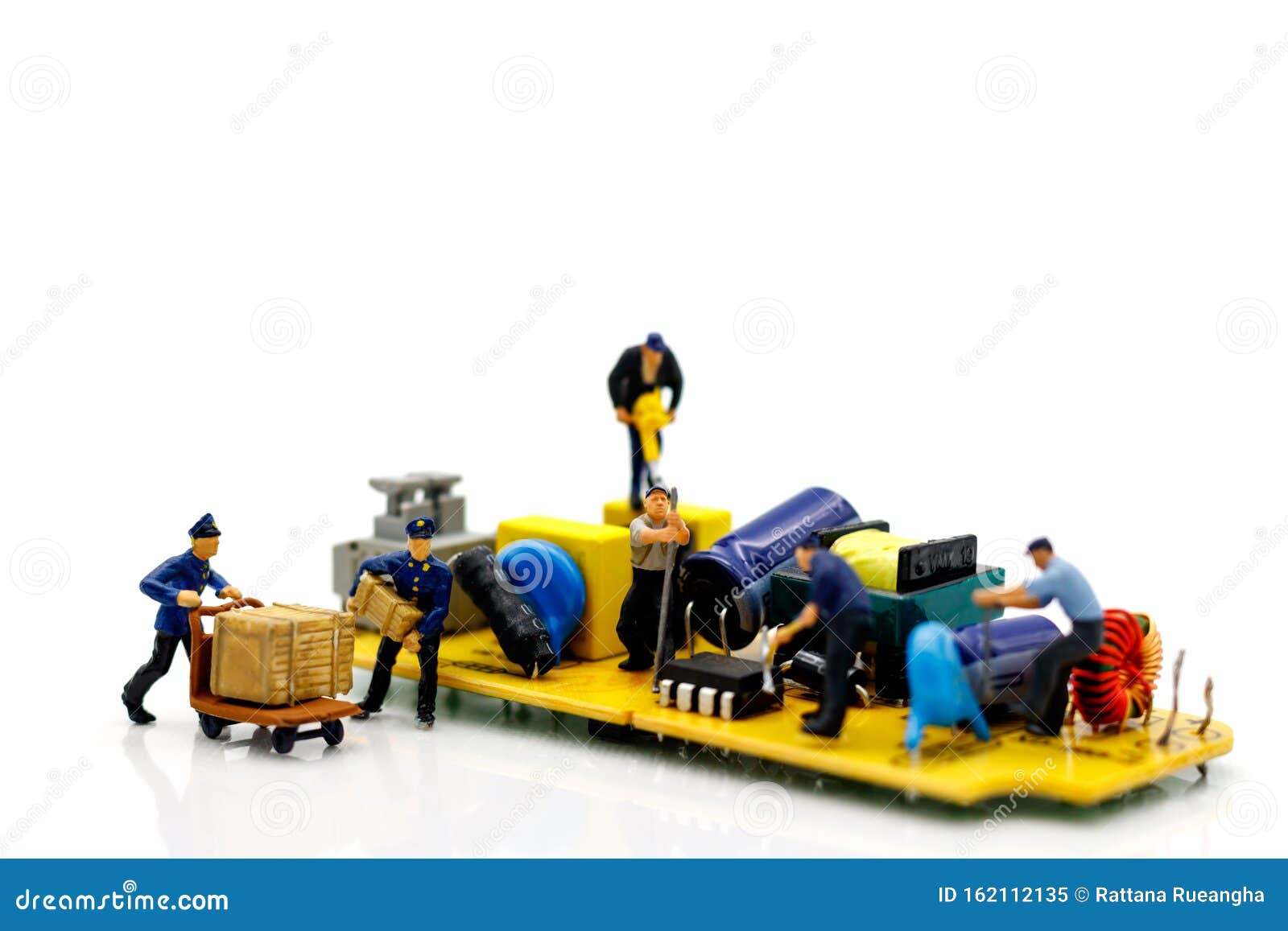 Miniature People: Engineers Fixing Error on Chip of Circuit Board ...