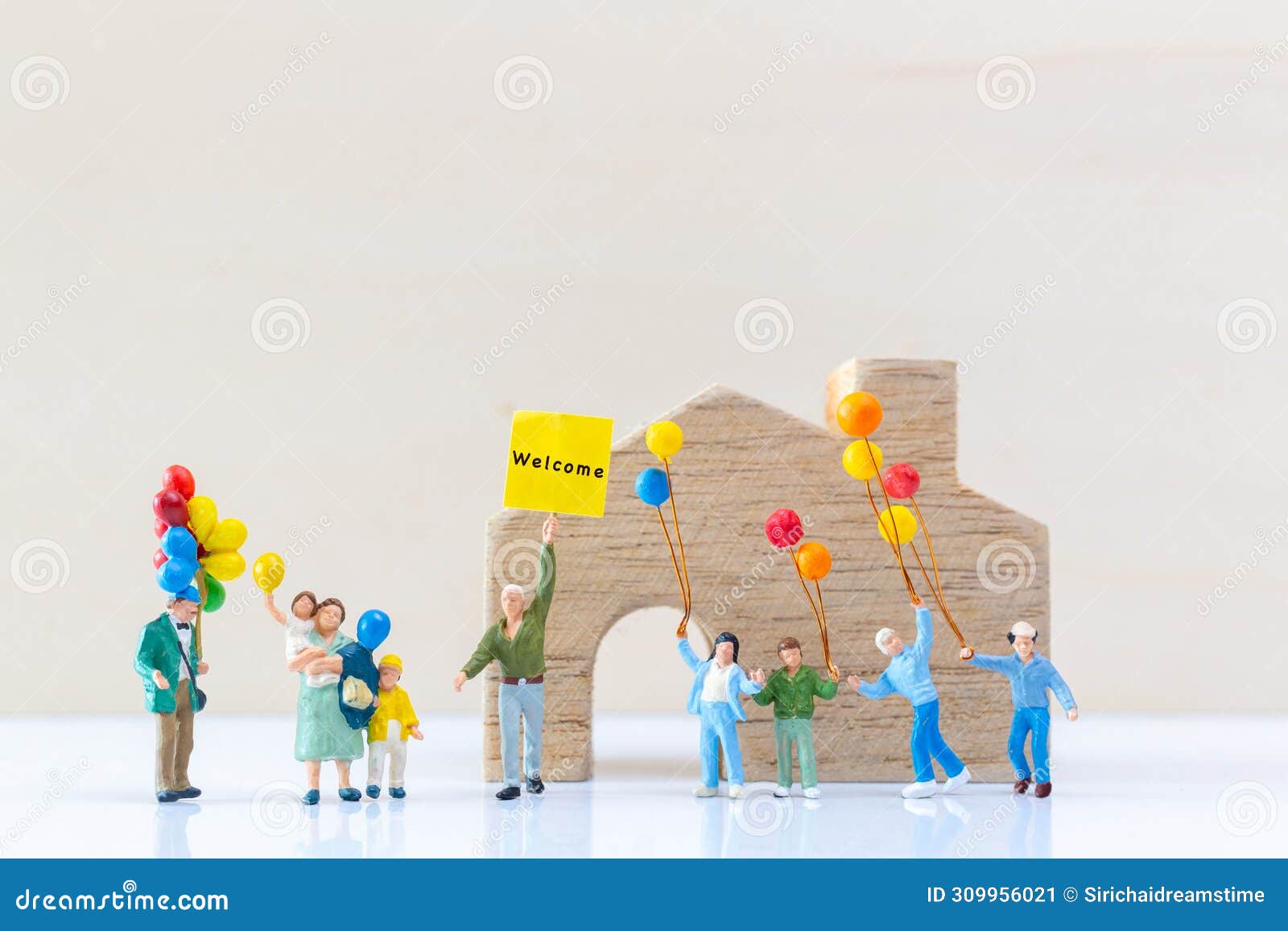 Miniature People Holding Welcome Signs at Front of the Home Stock Image ...