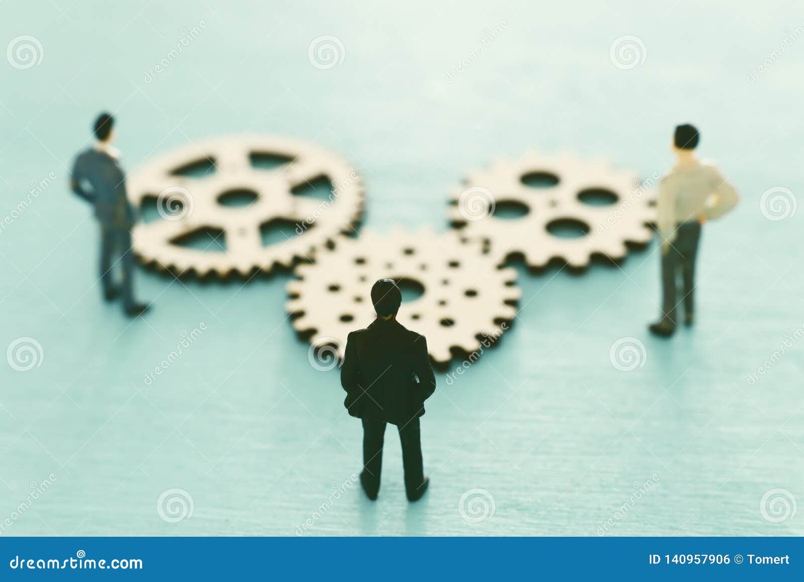 Miniature People Looking at Cogwheel in Set of Gears Mechanism. Problem ...