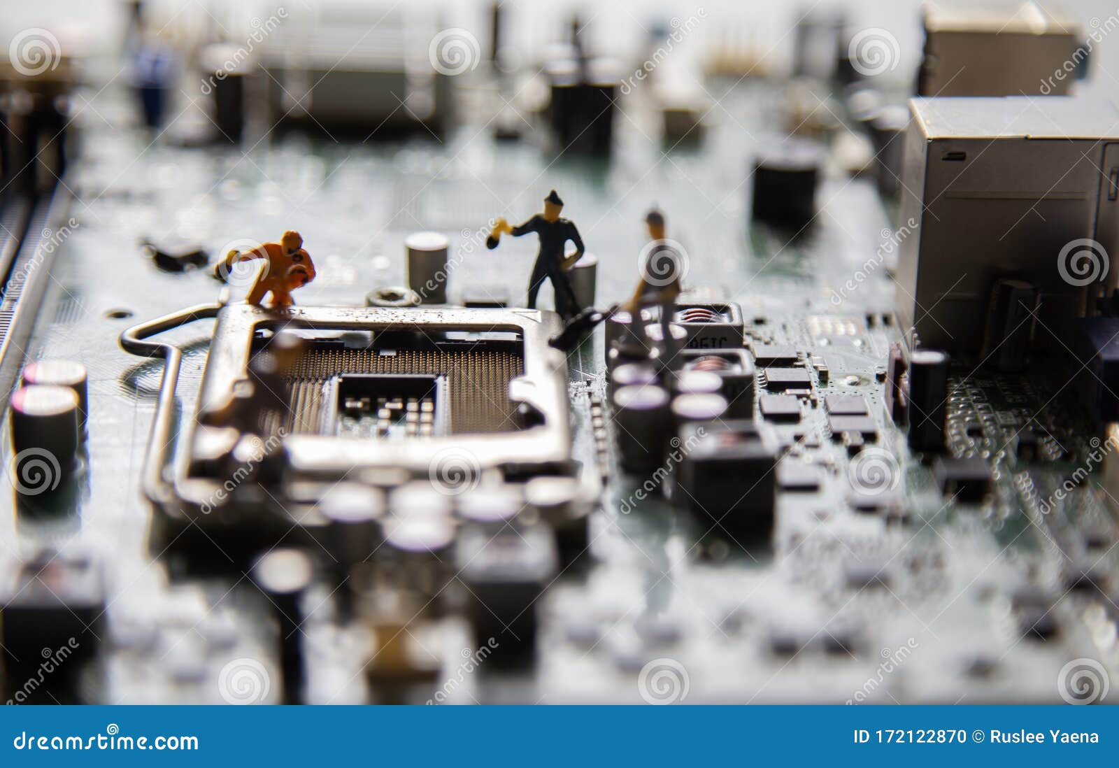 Miniature People Motherboard and CPU Repair, Concept: Working in ...