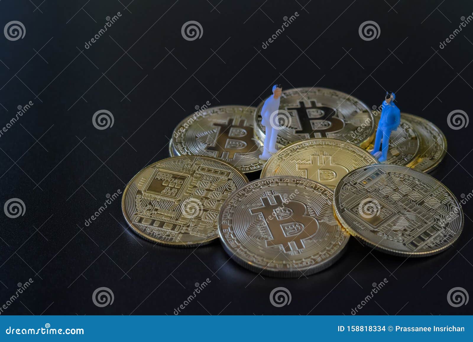 Miniature People, Small Model Human Figure Standing on Golden Bitcoins ...