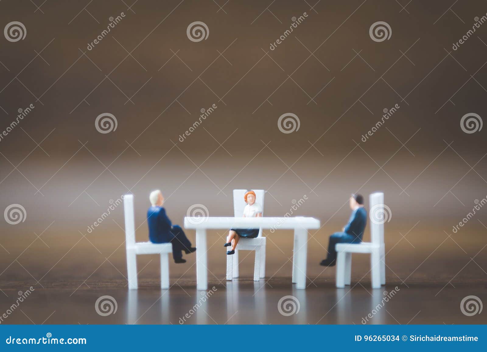Miniature People Team Sitting Down on the Chair Stock Photo - Image of ...