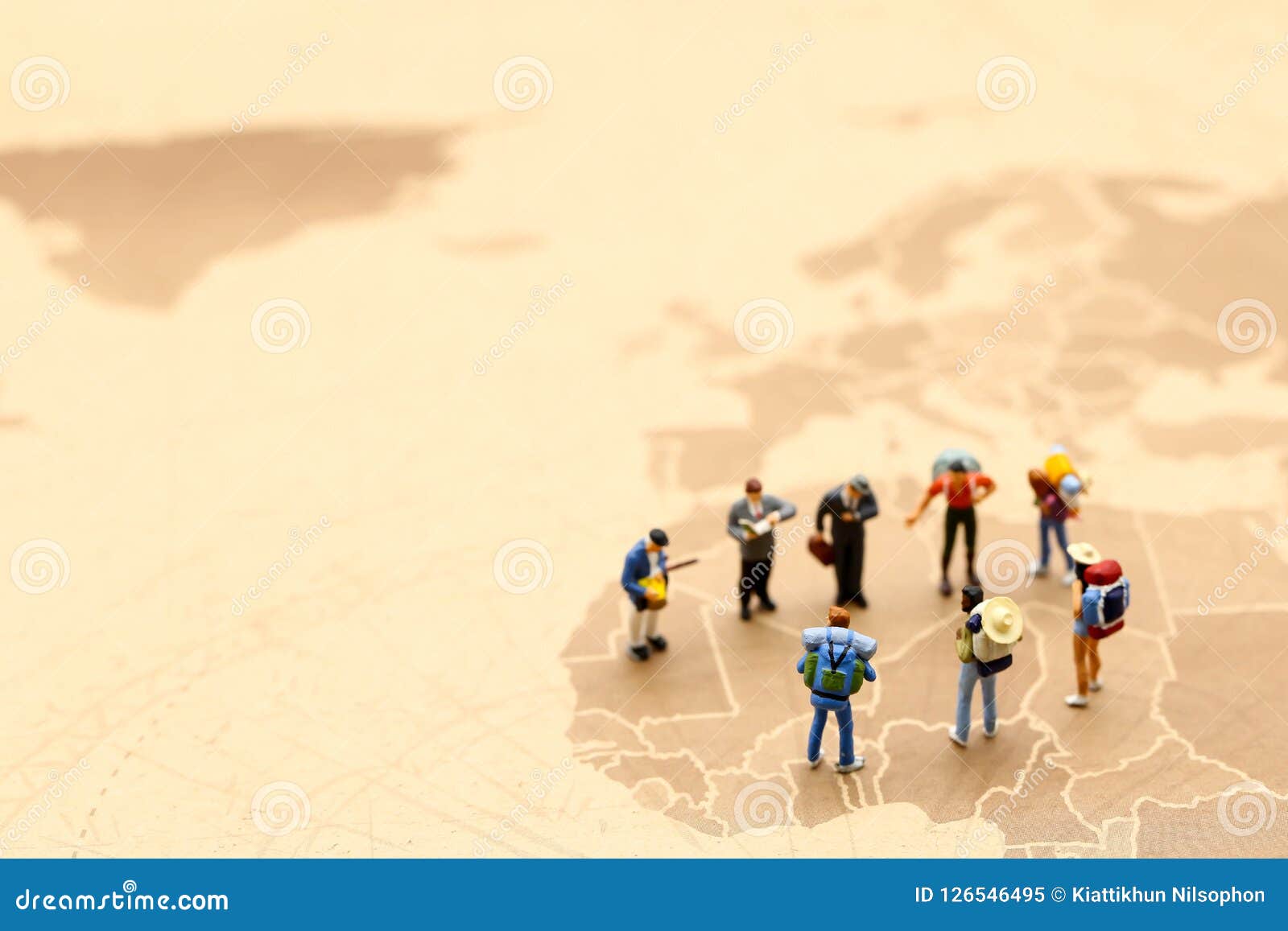 Miniature People : Traveler Reading a Map Using Concept of Map R Stock ...