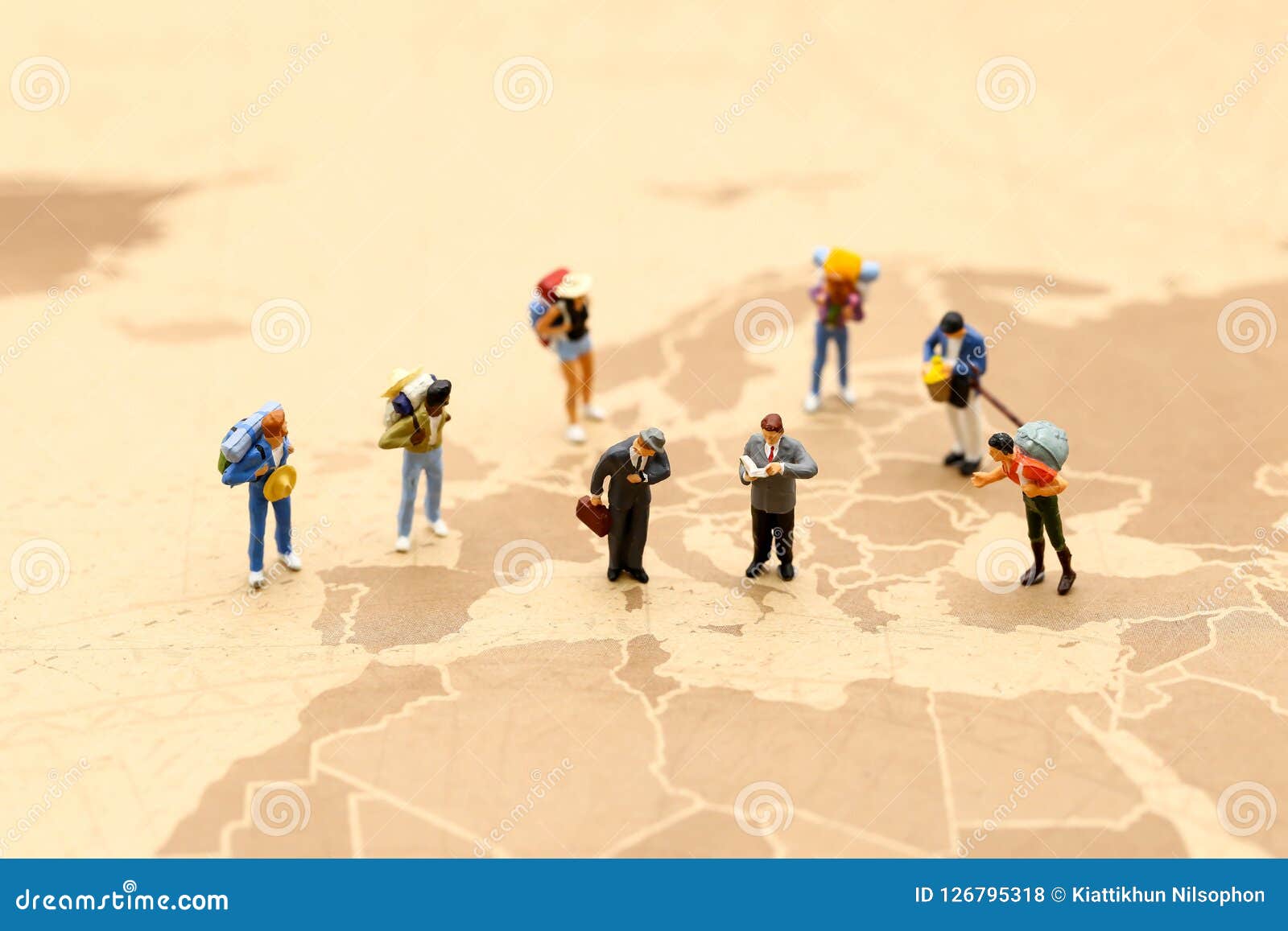 Miniature People : Traveler Reading a Map Using Concept of Map R Stock ...