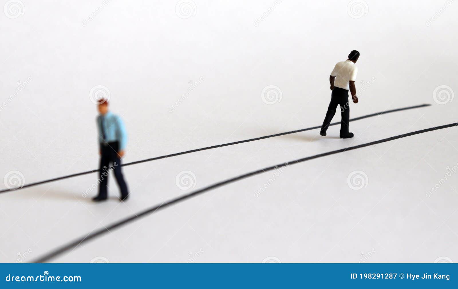 Miniature People Walking in Different Directions. Stock Image - Image ...