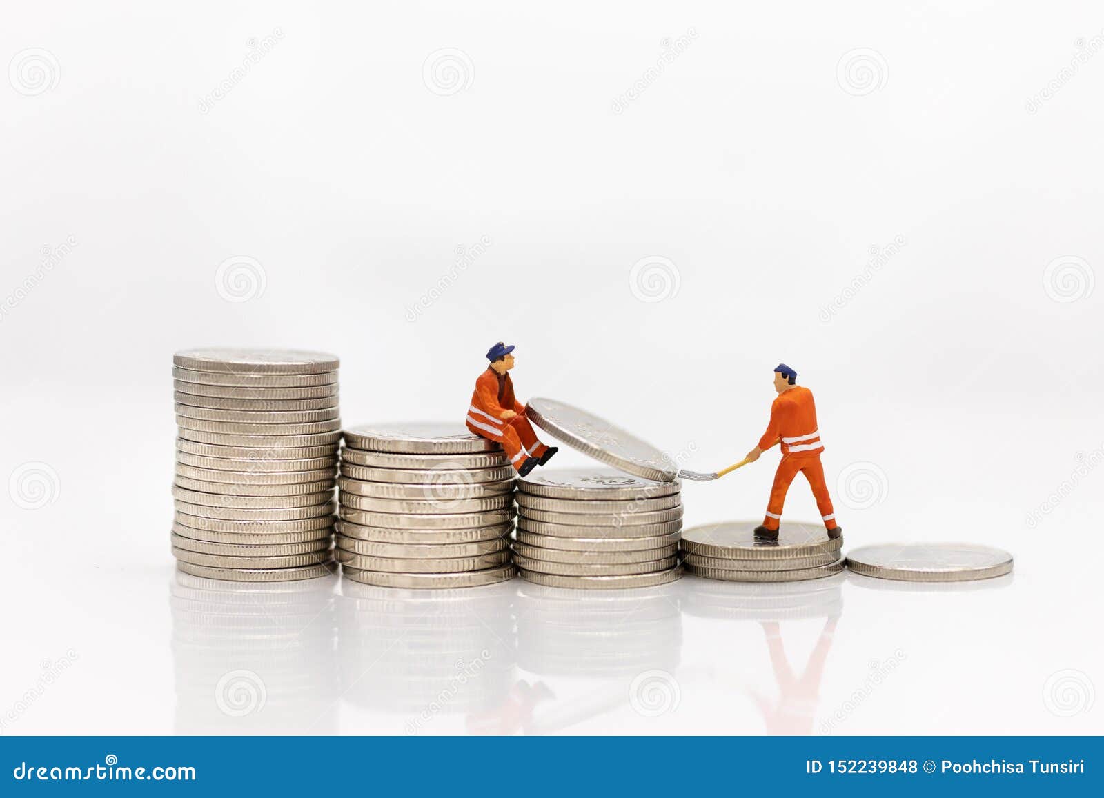 Miniature People: Worker Working on Stack of Coins, Income from Work ...