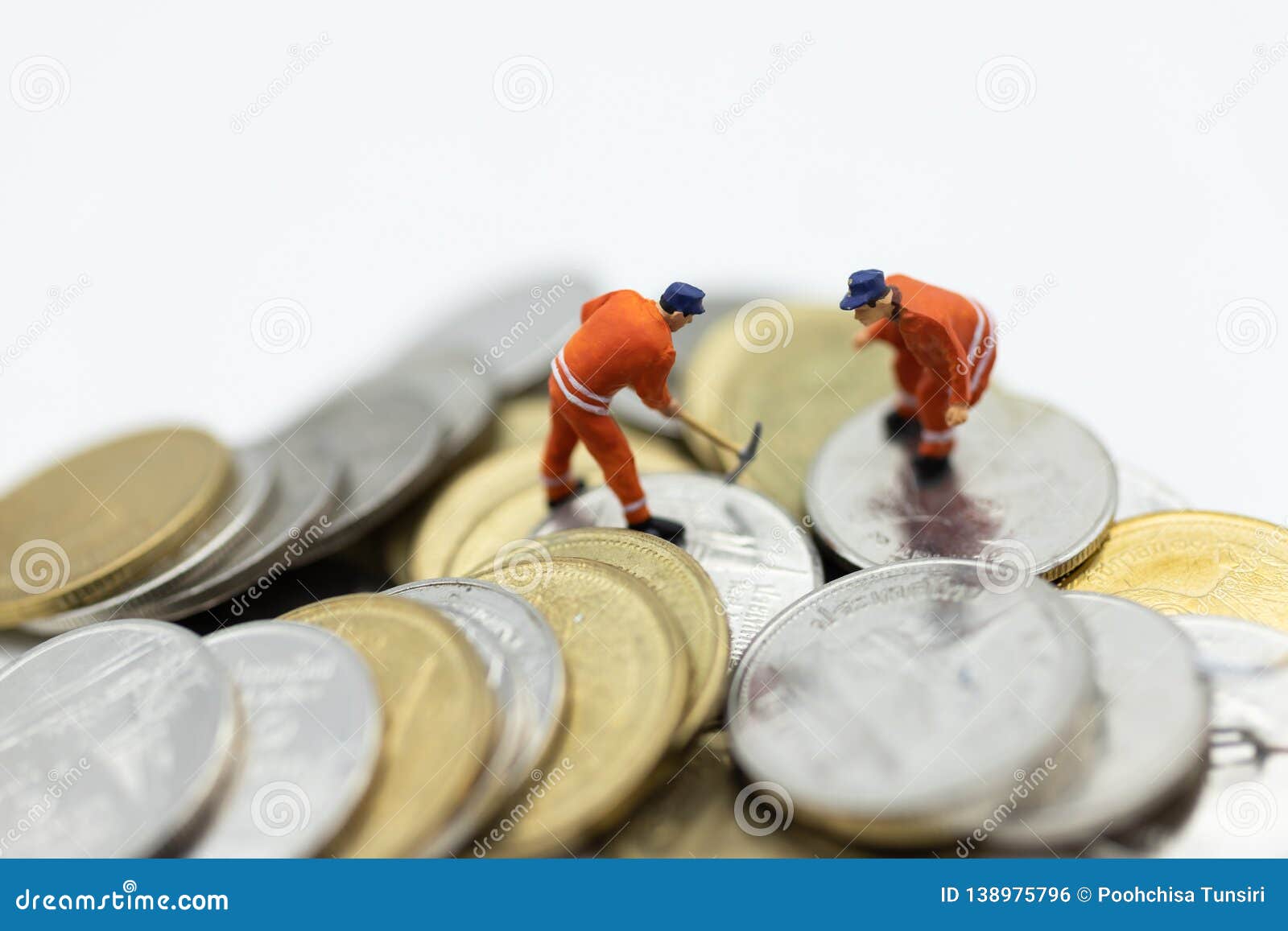 Miniature People: Worker Working on Stack of Coins, Income from Work ...