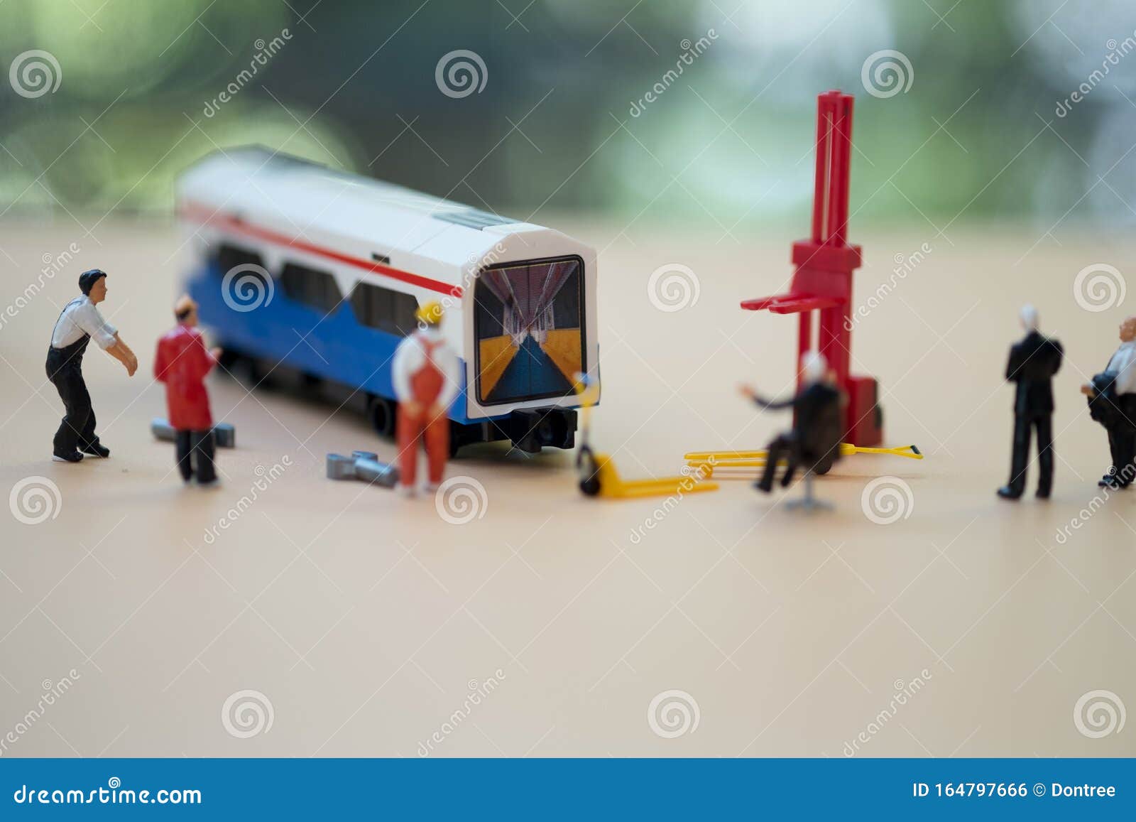 Miniature People: Workers Fixing Train Stock Photo - Image of person ...