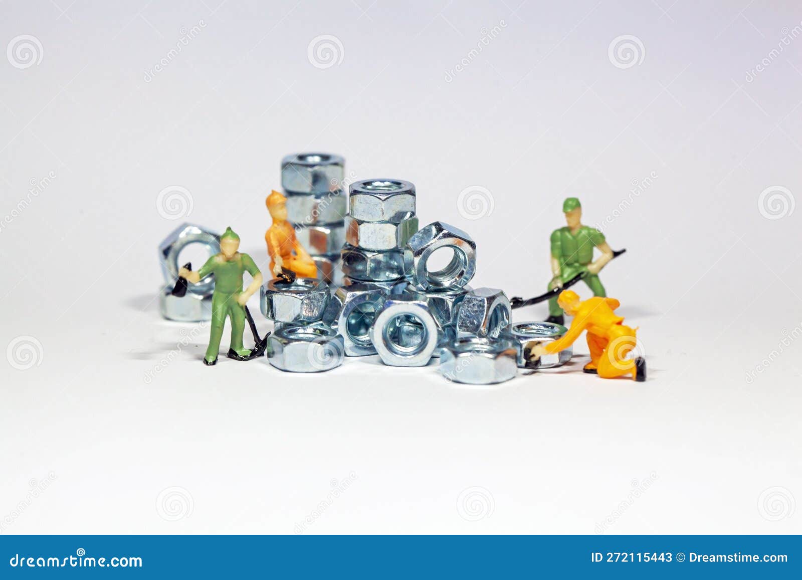 Miniature People Working on Nuts Stock Image - Image of mini, metallic ...