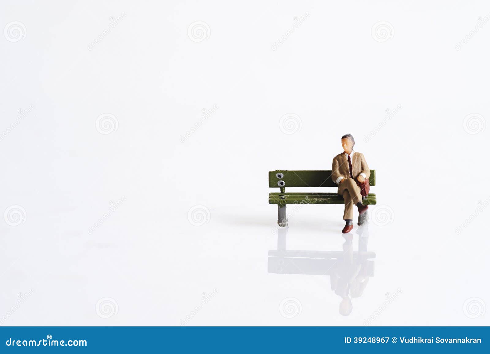 Miniature Peoples Sit on Bench Stock Image - Image of mini, work: 39248967